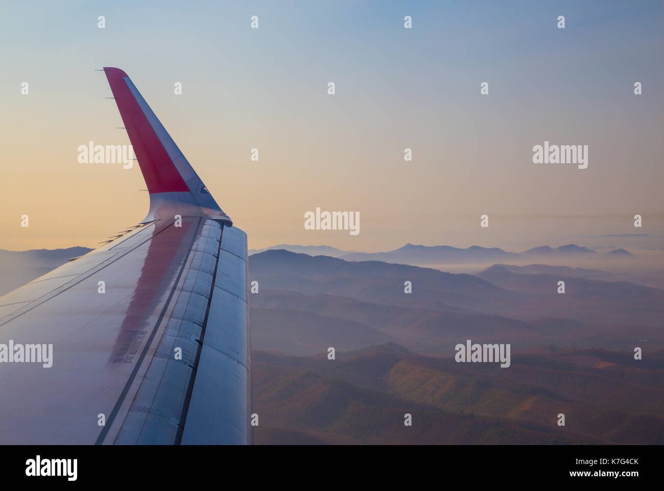 View from the window of an airplane flying Stock Photo - Alamy
