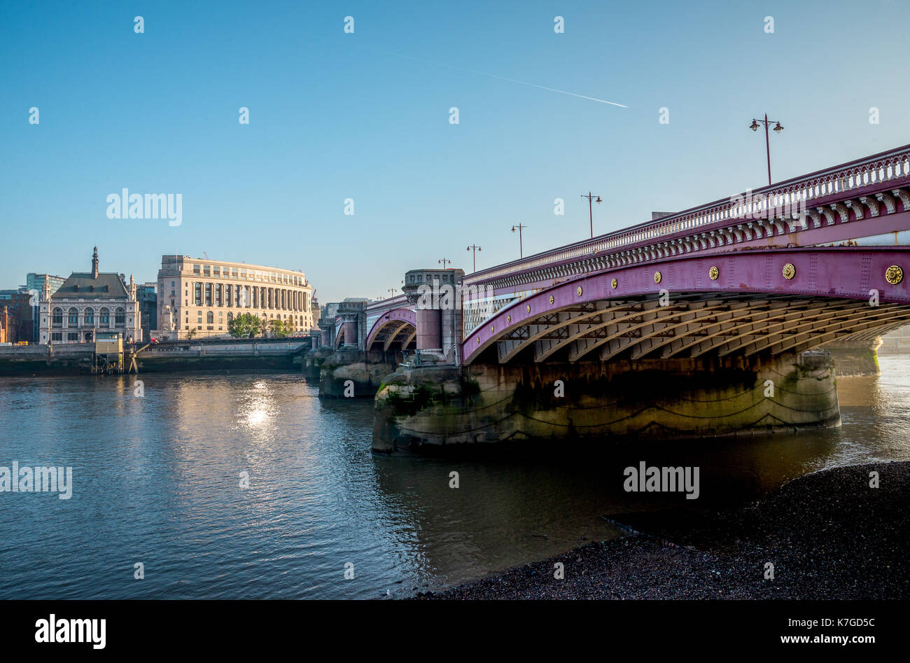 Blackfriars bridge across Thames River and Unilever House early in the ...