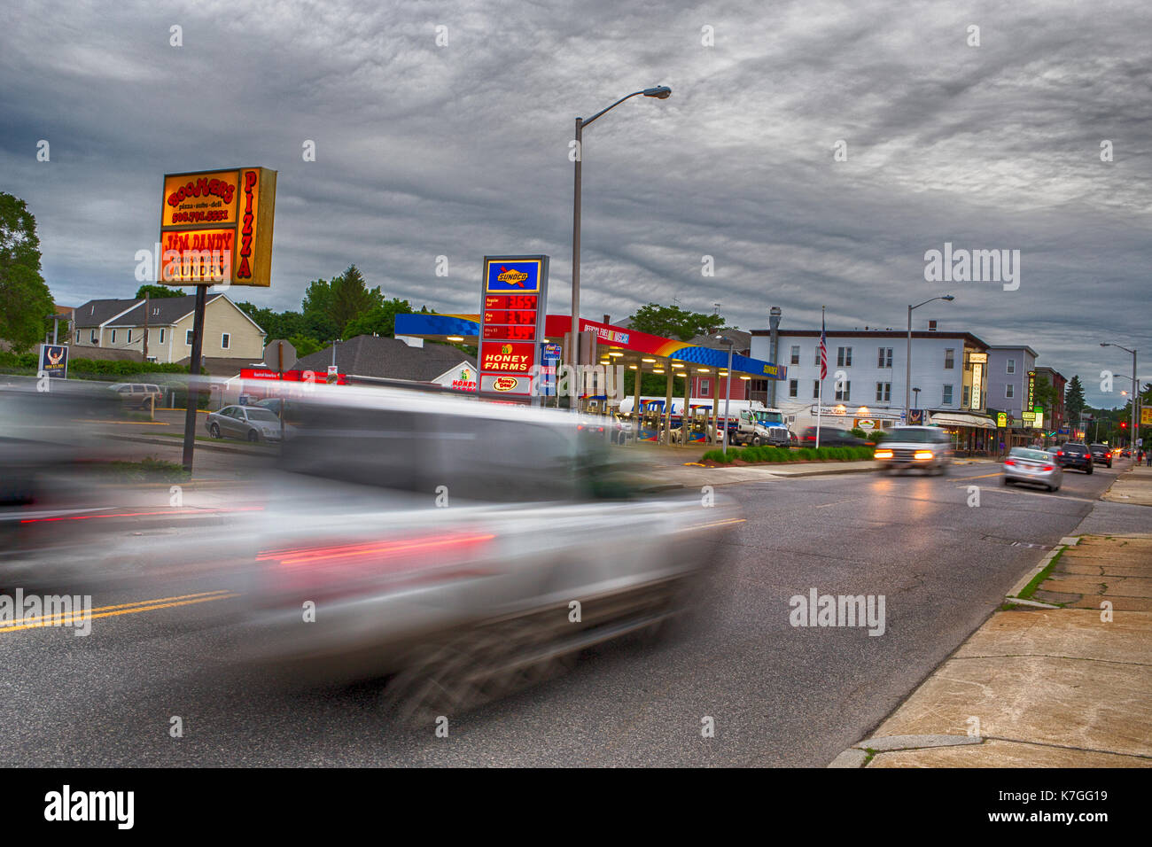 Traffic on Highland Street in Worcester, MA at night Stock Photo - Alamy