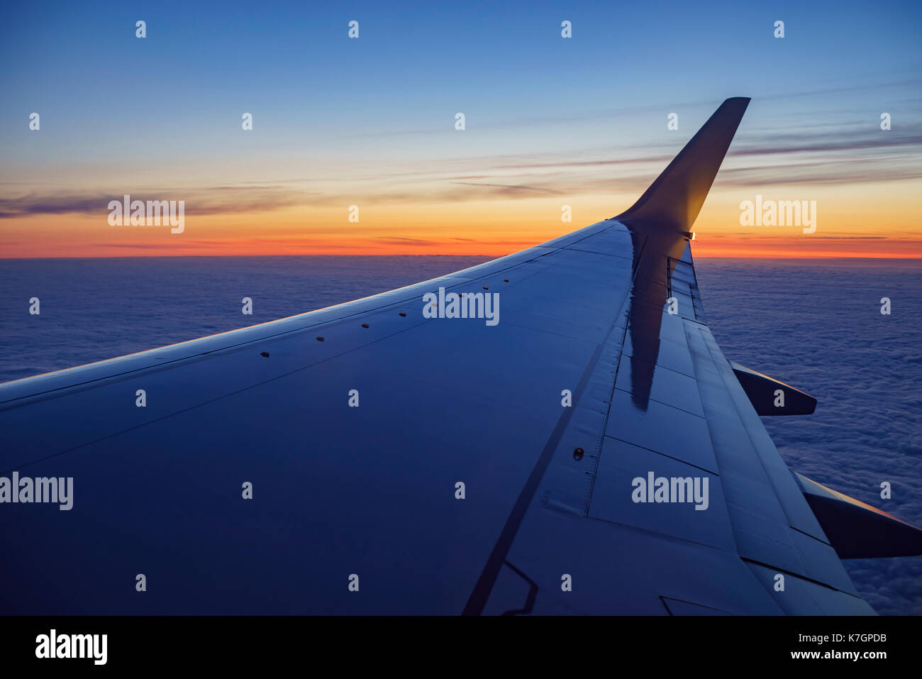 Sunset view of sky from a window seat in an airplane at Los Angeles ...
