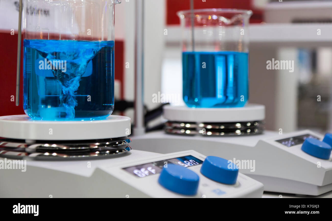 Beaker on magnetic stirrer in lab Stock Photo - Alamy