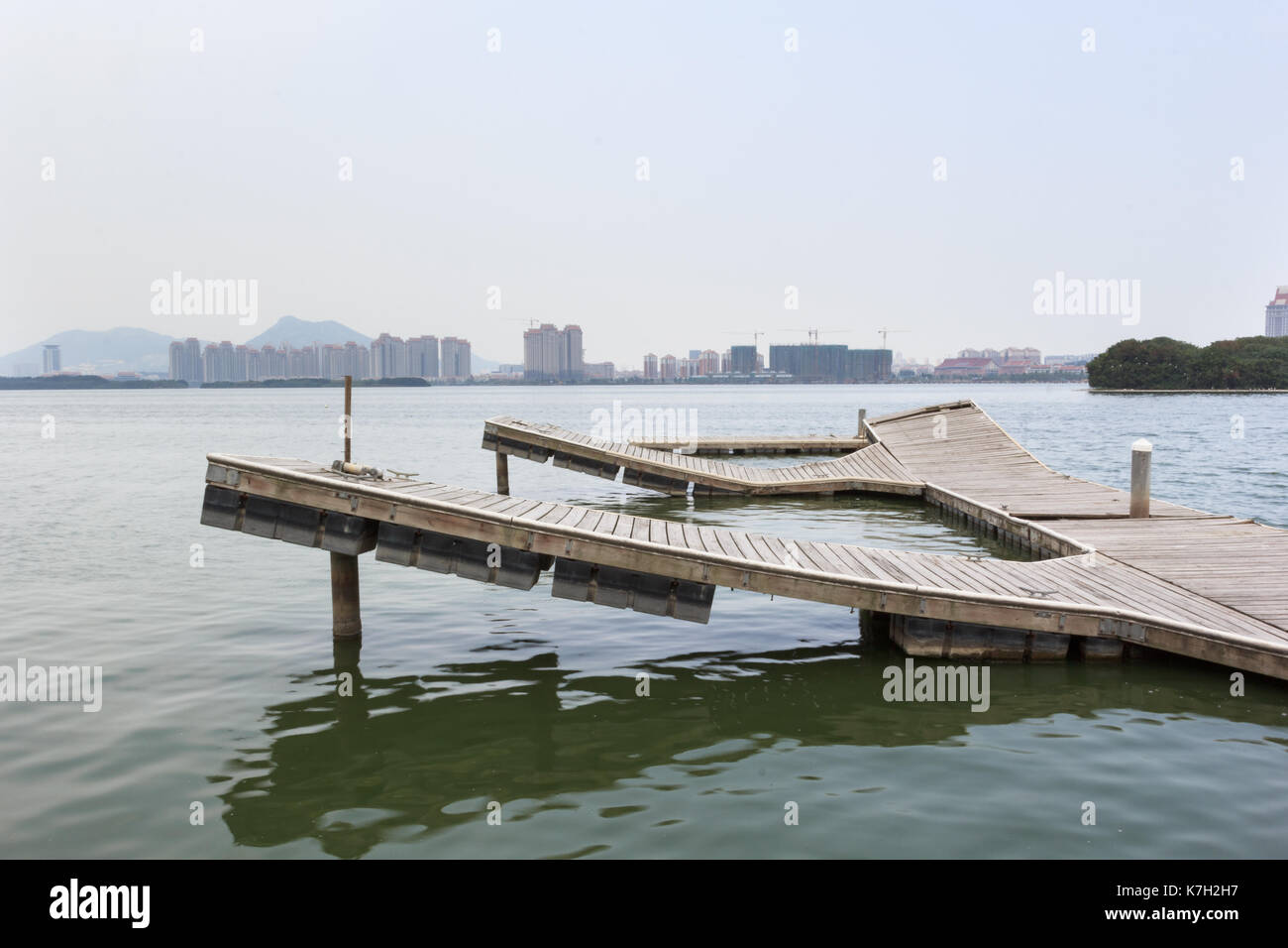 Dock boardwalk around seaside Stock Photo - Alamy