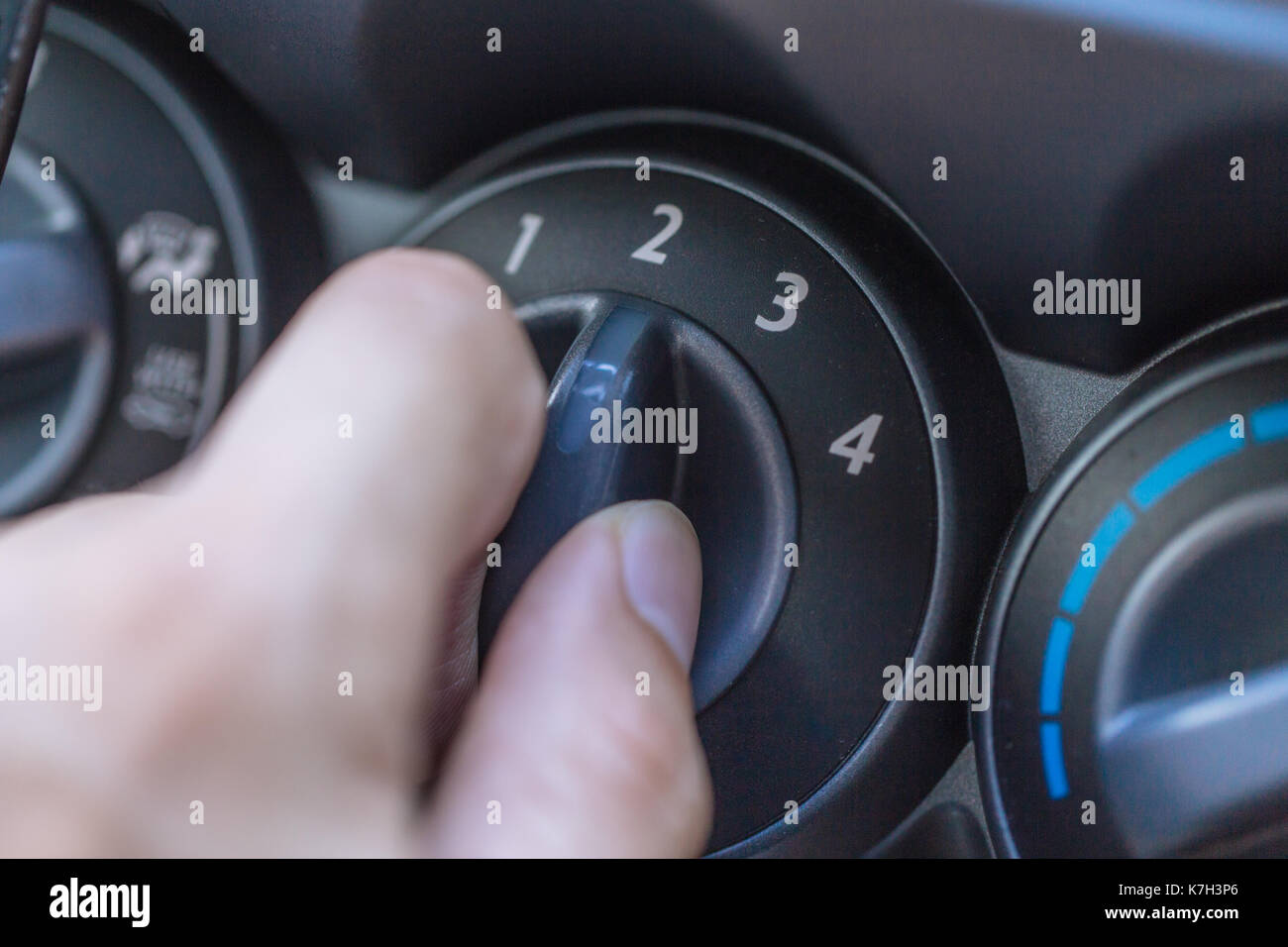 closeup hand at car cooling air conditioner fan speed adjust Stock ...