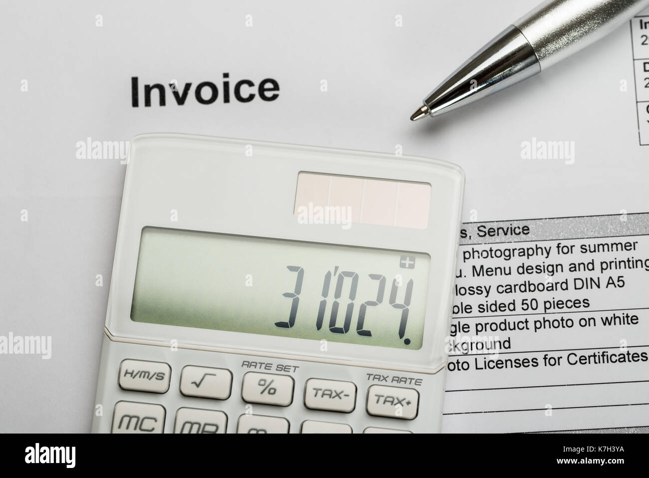 Invoice calculator pen hi-res stock photography and images - Alamy