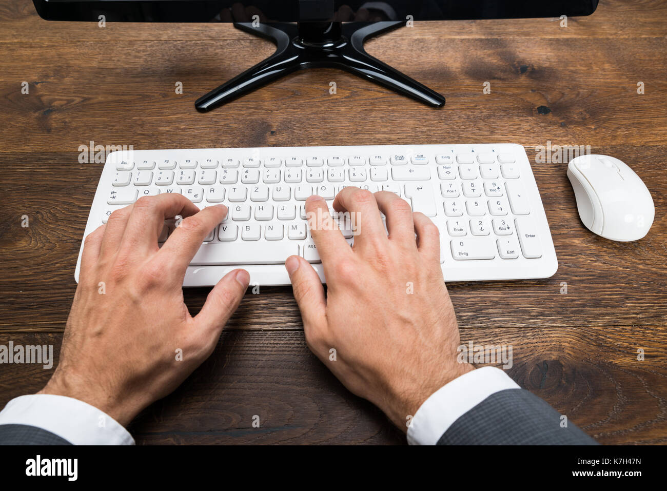 Wooden hand on mouse keyboard hi-res stock photography and images - Alamy