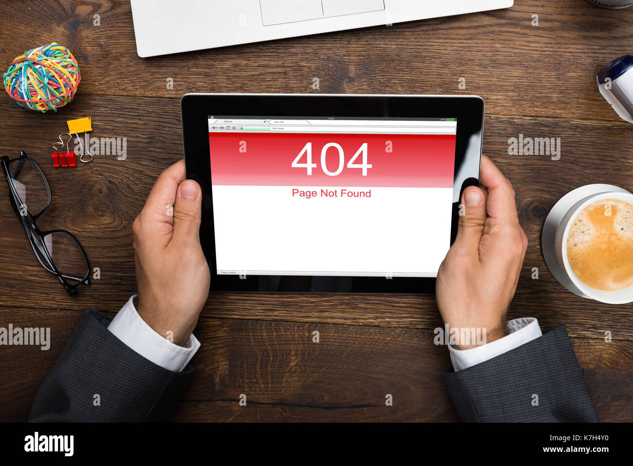 High Angle View Of Businessman's Hand Holding Digital Tablet With Error ...