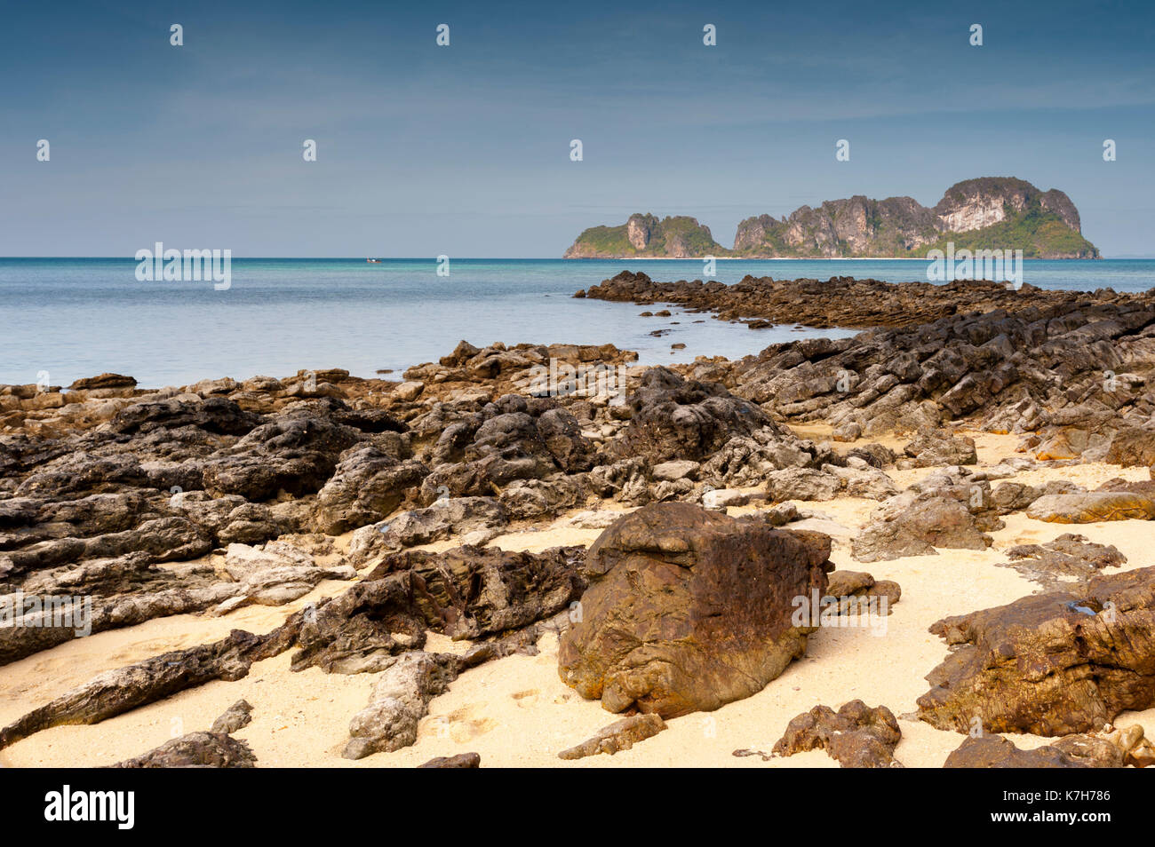 Thailand beach with rocks Stock Photo - Alamy