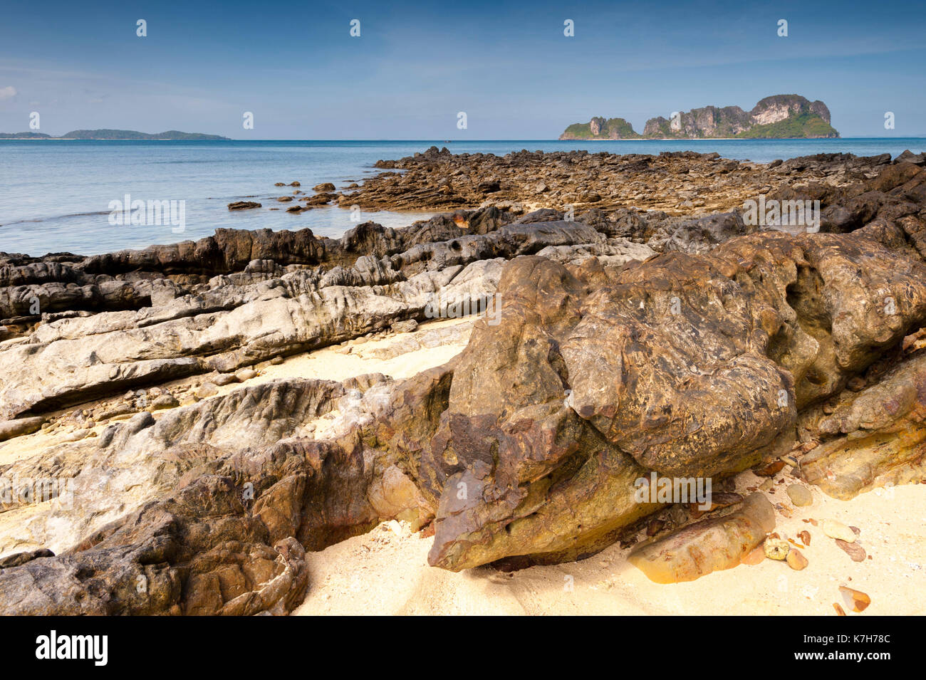 Thailand beach with rocks Stock Photo - Alamy