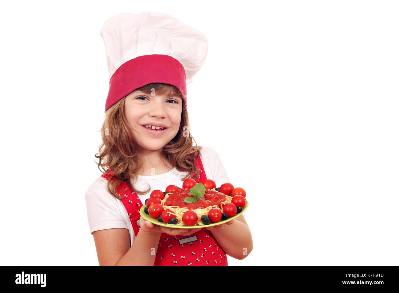 happy little girl cook with spaghetti Stock Photo - Alamy
