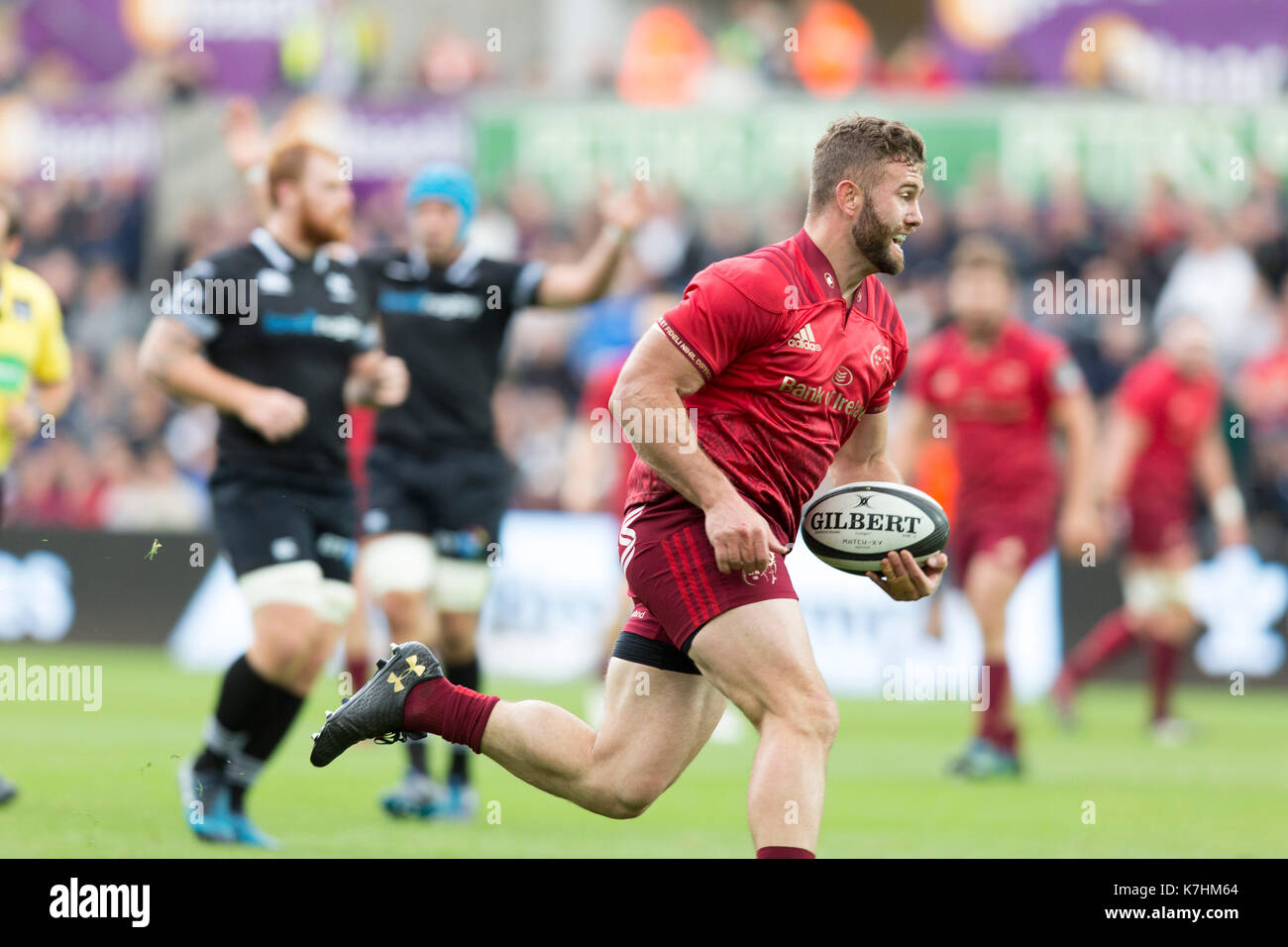 Centre Jaco Taute of Munster in action at the Liberty Stadium, Swansea ...