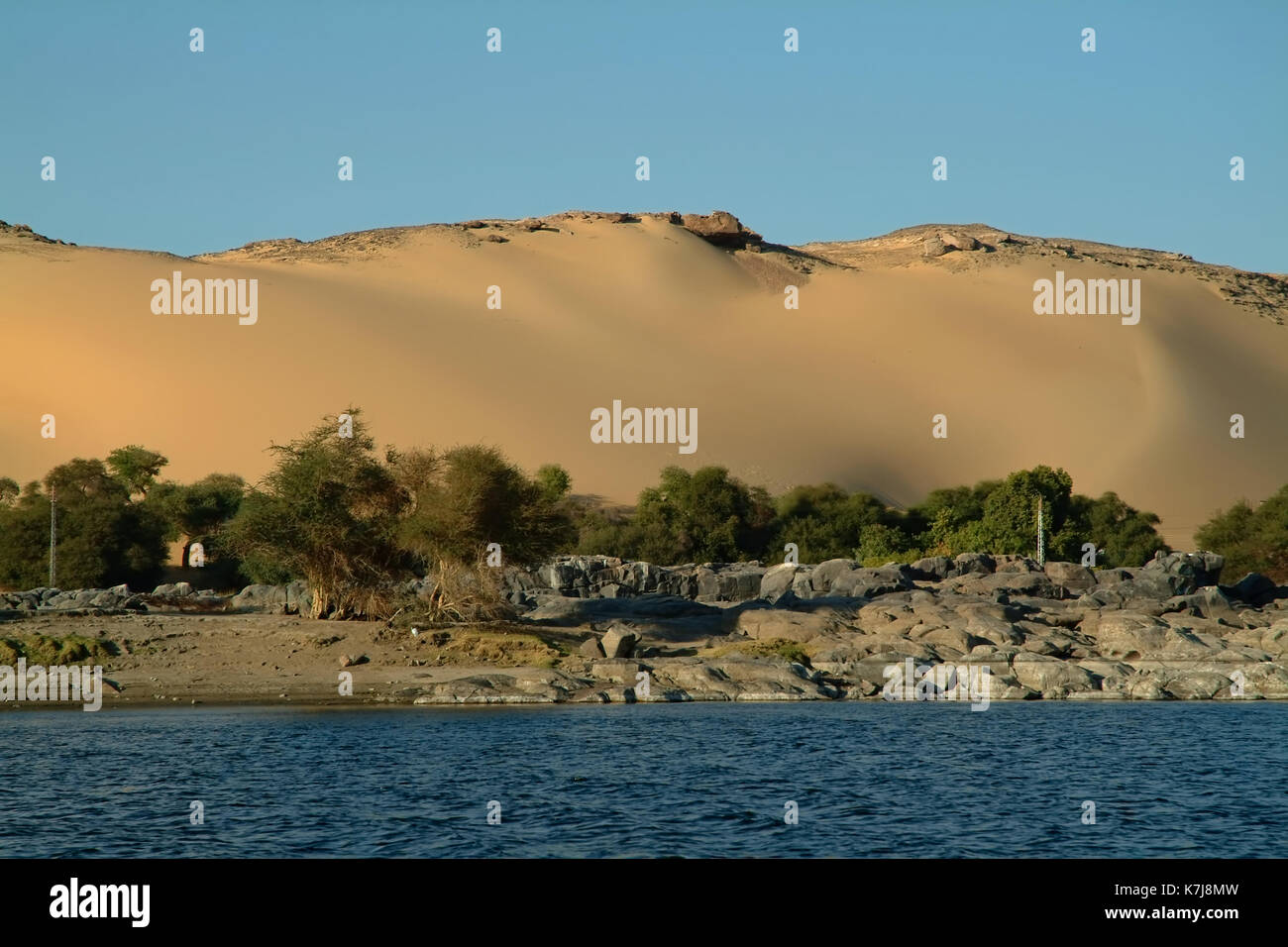 Huge velvet sand dune on the island of Elephantine without people, Blue ...