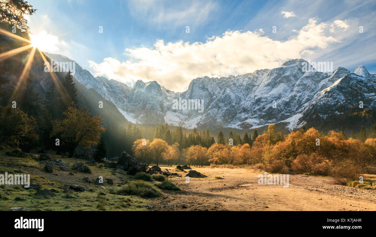 sun rise behind the peak in a colorful autumn morning Stock Photo - Alamy