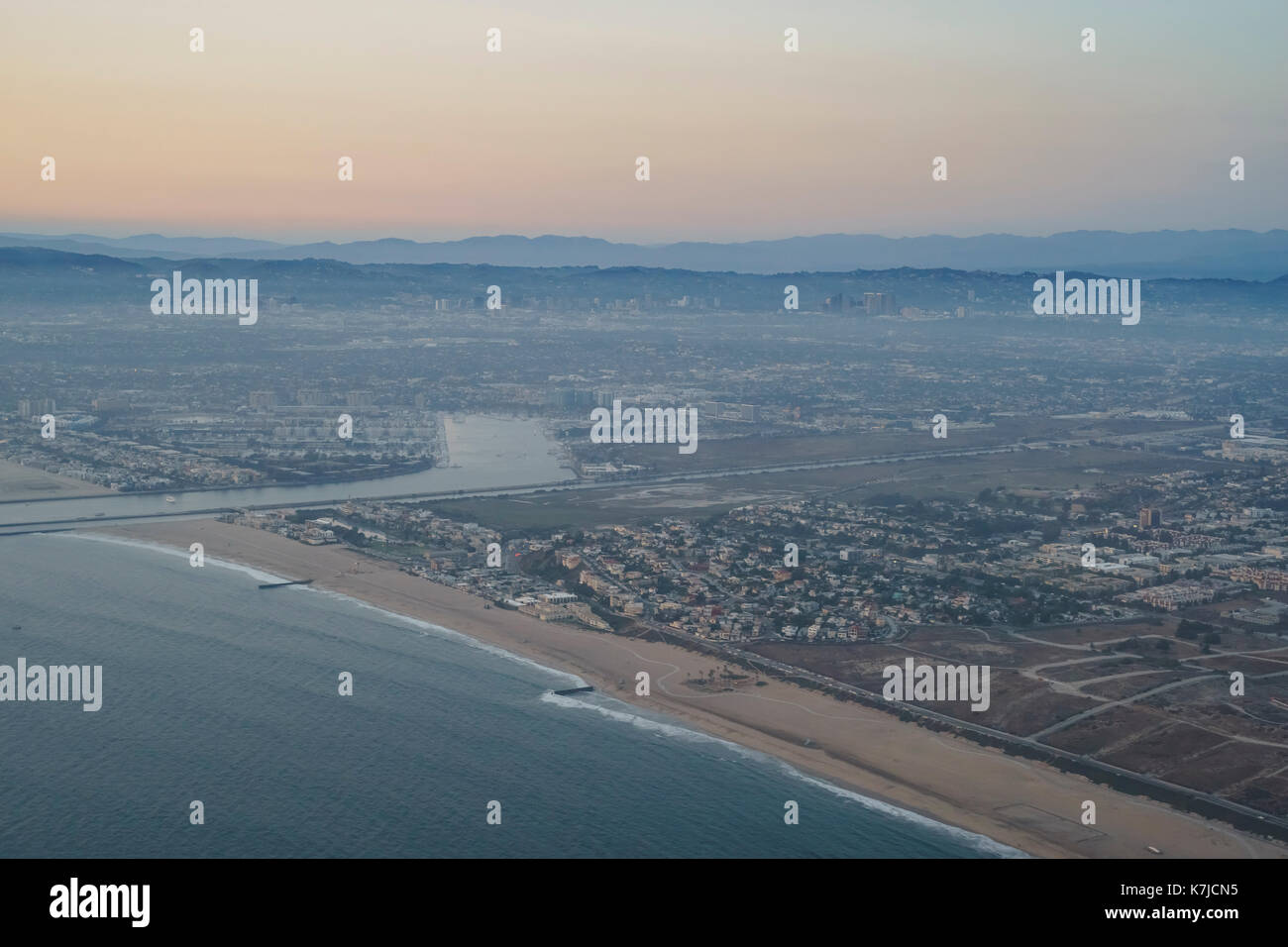 Sunset aerial Marina Del Rey Jetty and cityscape view of sky from a ...