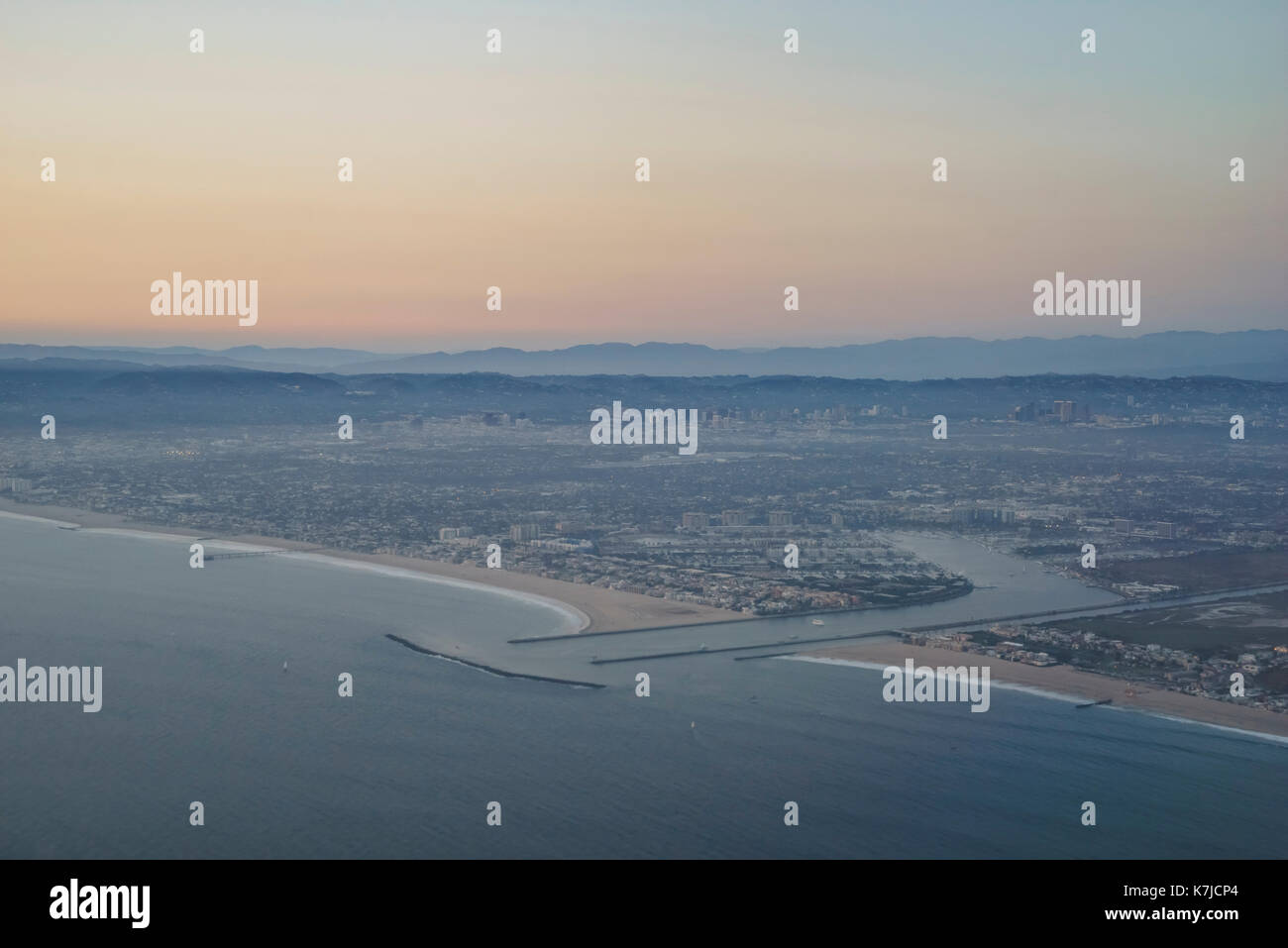 Sunset aerial Marina Del Rey Jetty and cityscape view of sky from a ...