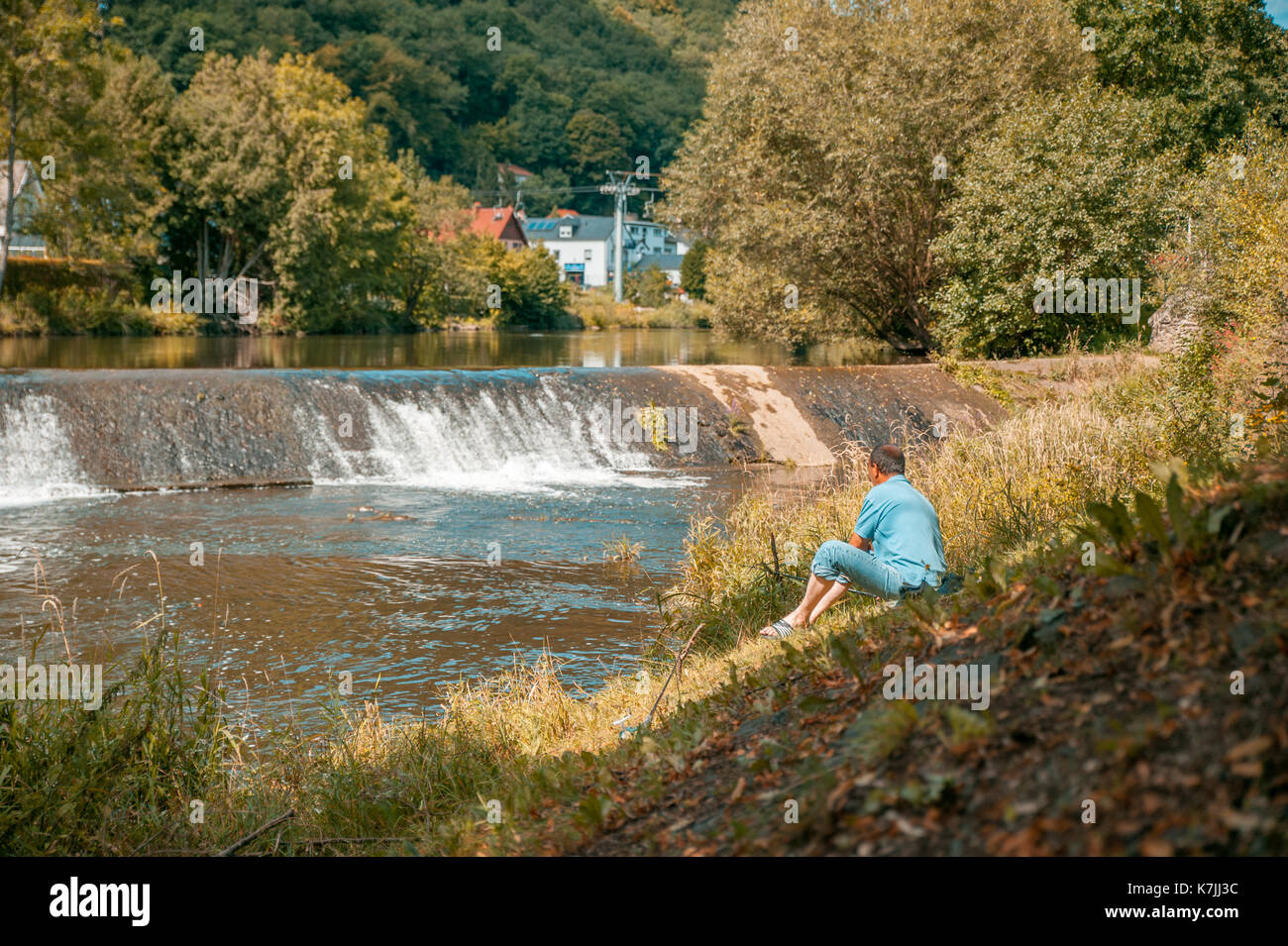 Trying to catch fish hi-res stock photography and images - Alamy