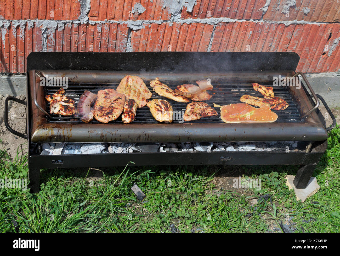 Family sunday barbecue grill Stock Photo - Alamy