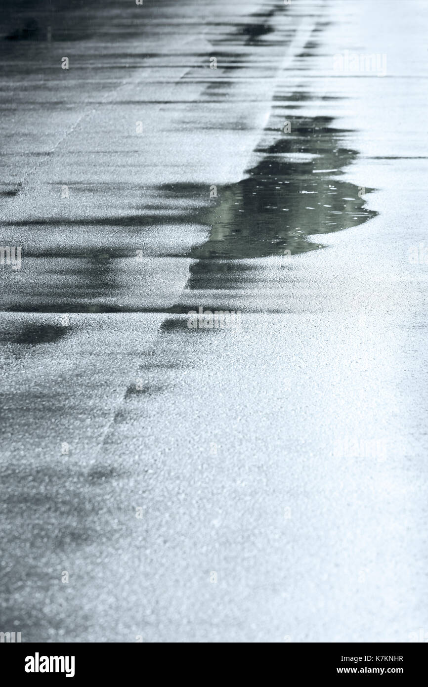 Raindrops on pavement hi-res stock photography and images - Alamy