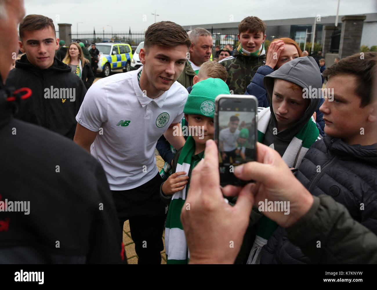 Celtic player Kevin Tierney poses with fans prior to the Ladbrokes ...