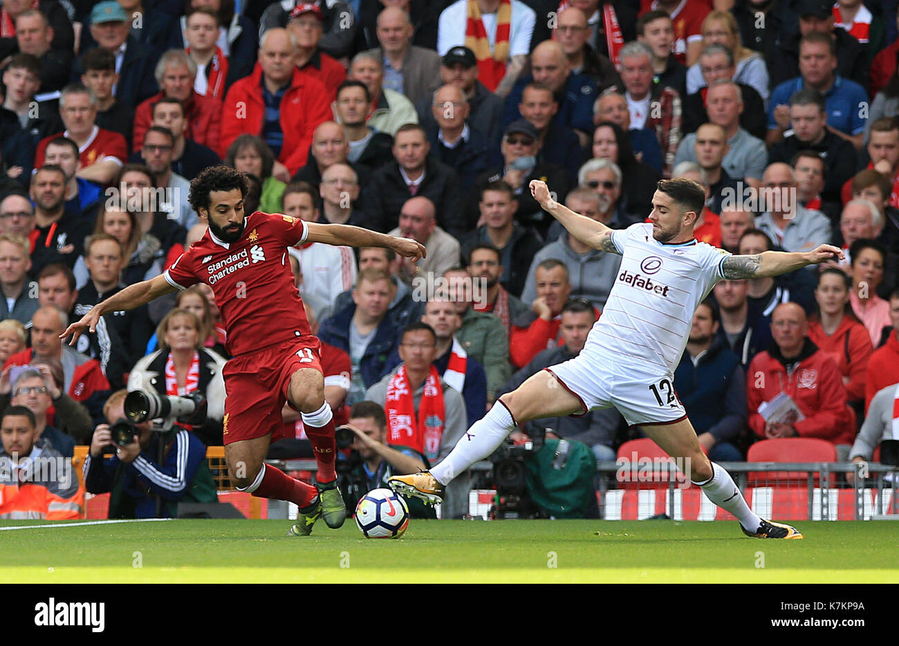 Liverpool's Mohamed Salah (left) and Burnley's Robbie Brady battle for ...