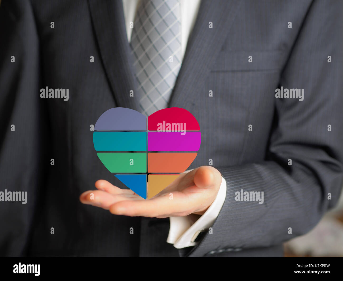 business man hold a heart shape chart Stock Photo - Alamy