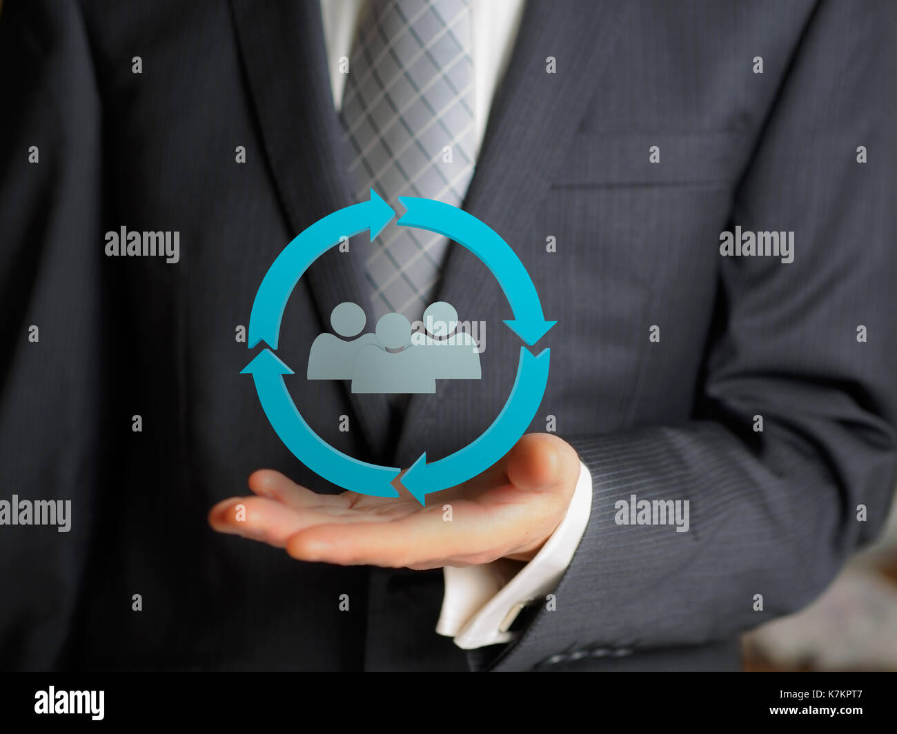 Business man hold a teamwork concept sign Stock Photo - Alamy
