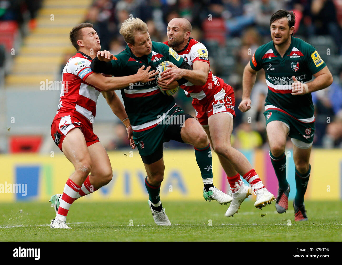 Leicester Tigers' Matthew Tait and Gloucesters' Lloyd Evans and Charlie ...