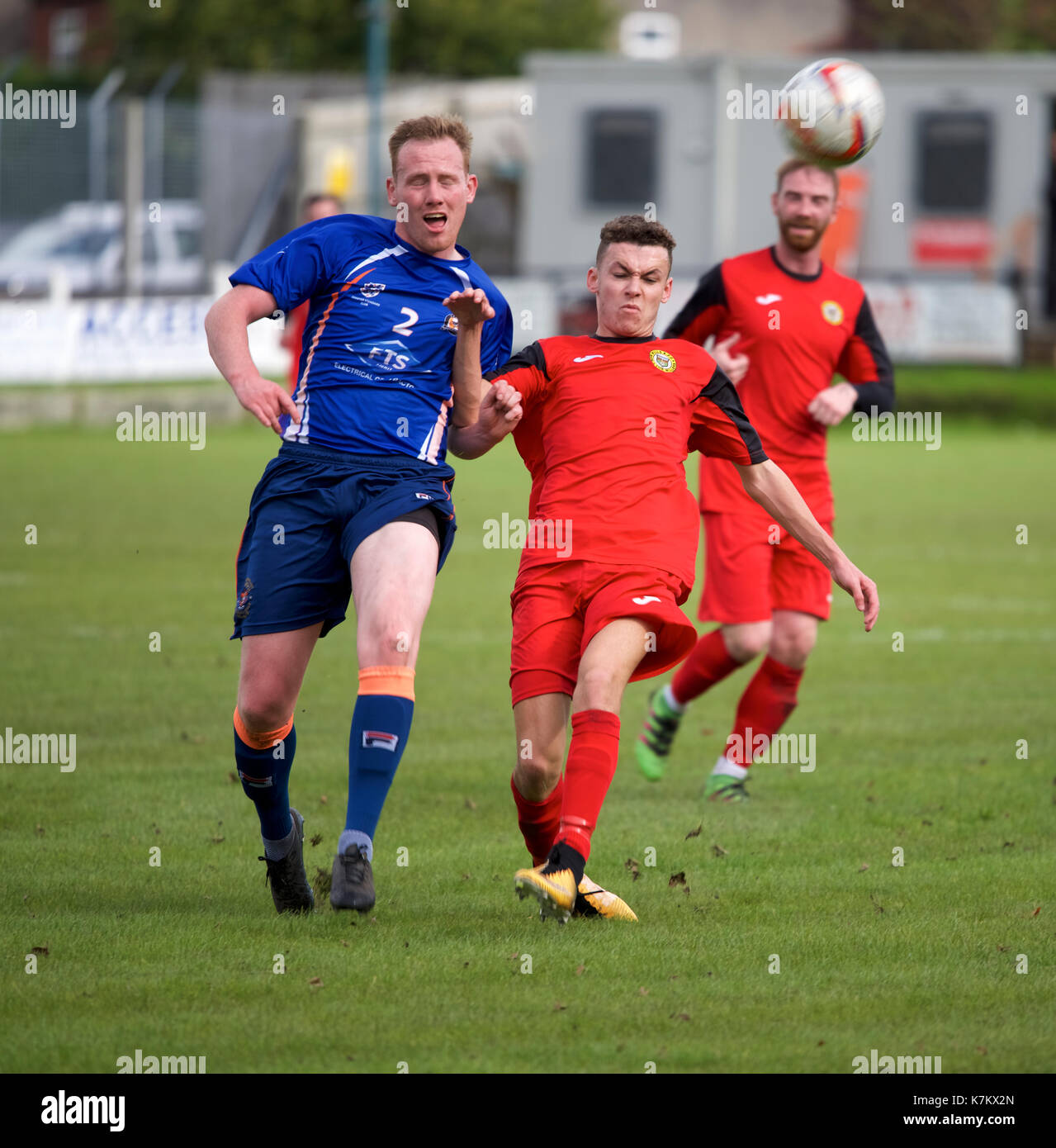 Football action from non-league match between New Mills FC and AFC ...
