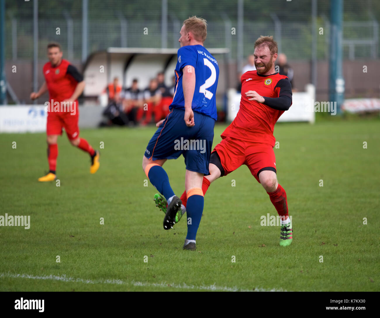Football action from non-league match between New Mills FC and AFC ...