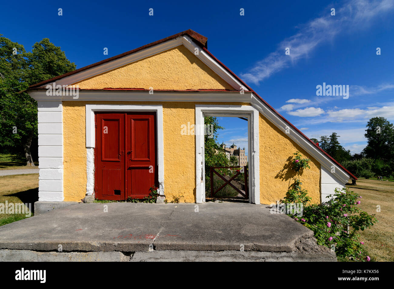 Historic building with Stora Sundby Castle in the background through ...
