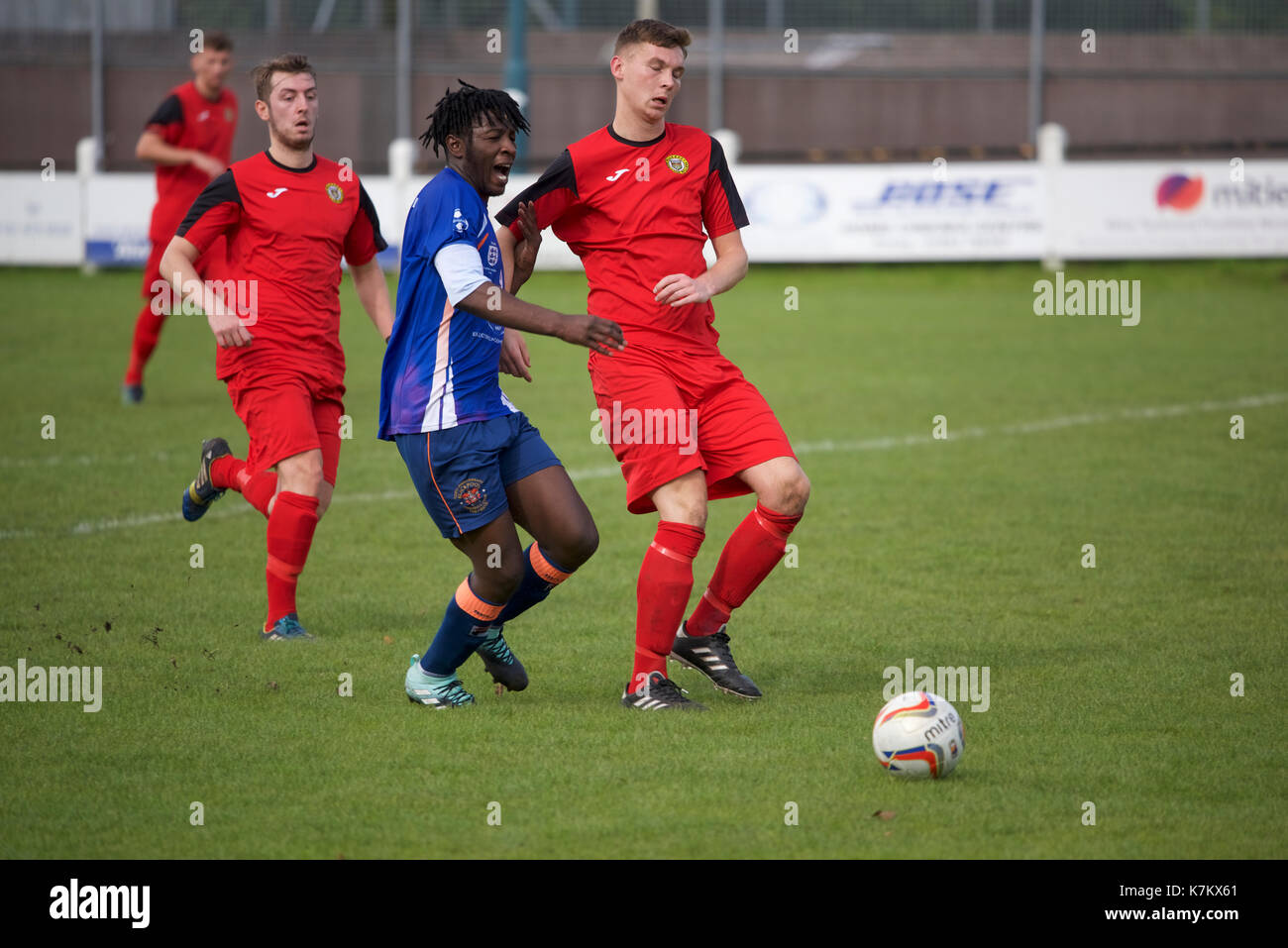 Football action from non-league match between New Mills FC and AFC ...