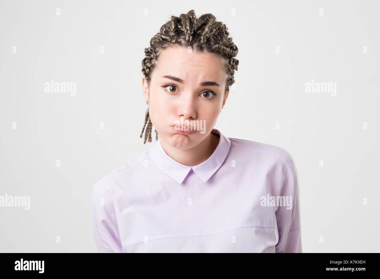 Woman blowing cheeks hi-res stock photography and images - Alamy