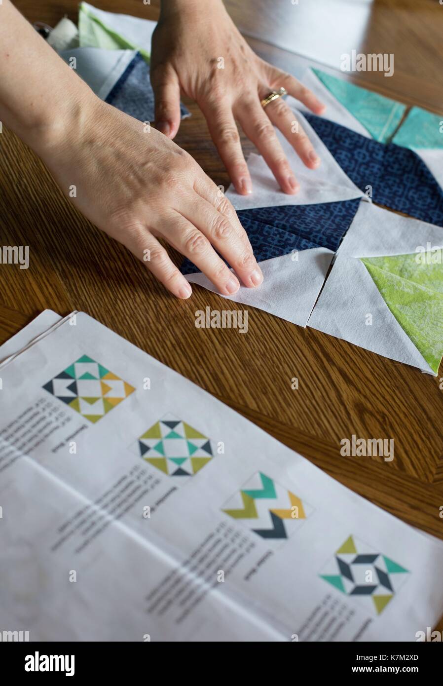 Close up of a person creating a quilt block Stock Photo - Alamy