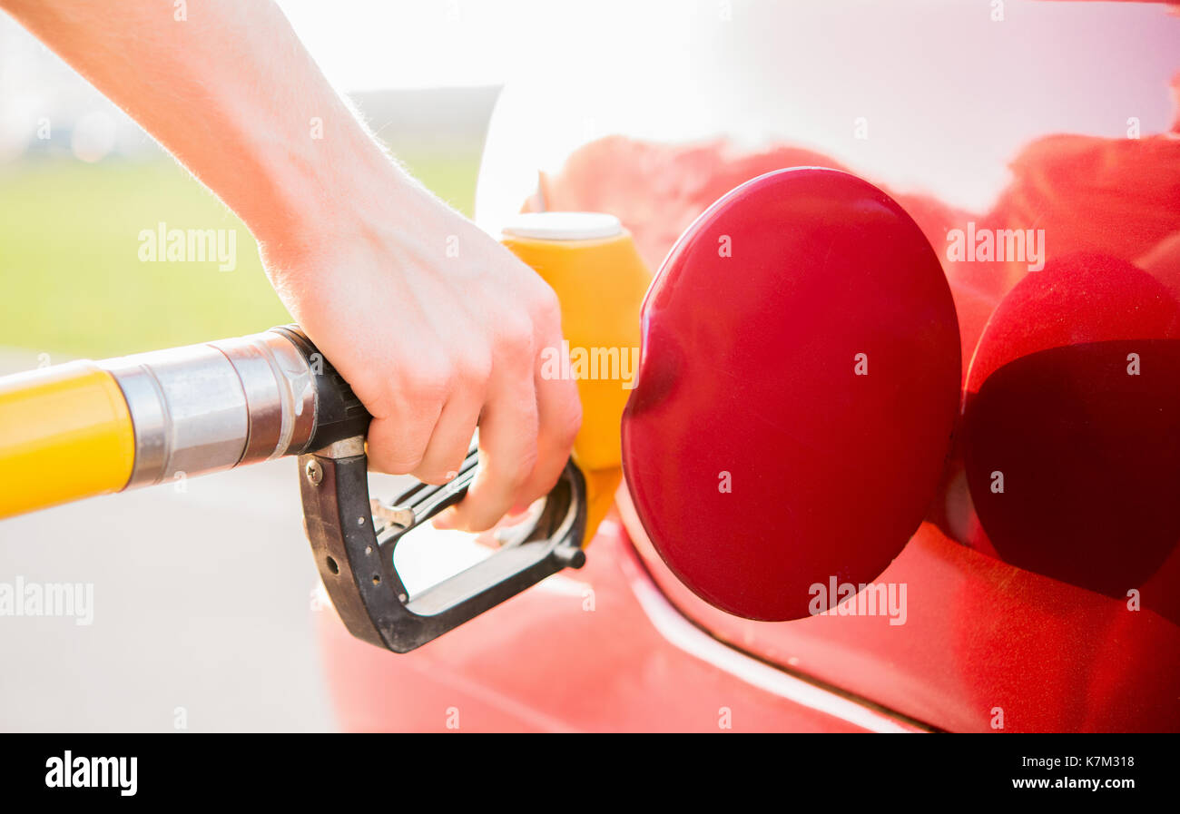 gas station fuel red car Stock Photo - Alamy