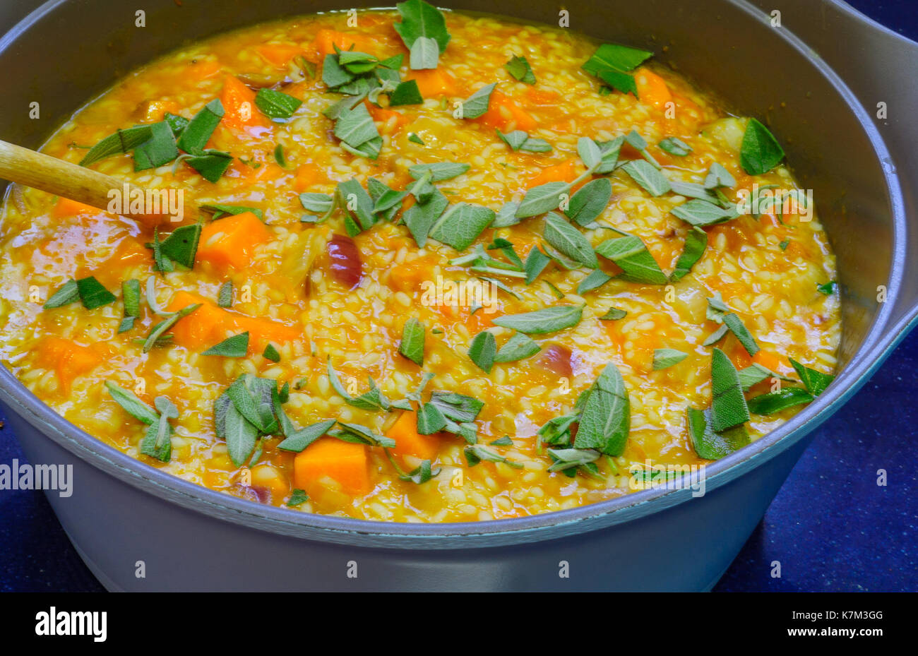 Risotto, an Italian rice dish, made with pumpkin and sage Stock Photo ...