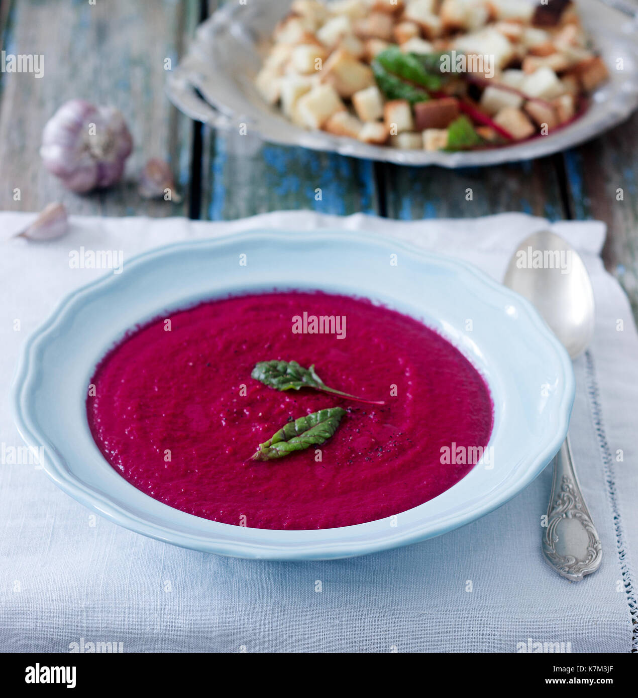 Beet cream soup with garlic. Rustic style, selective focus Stock Photo ...