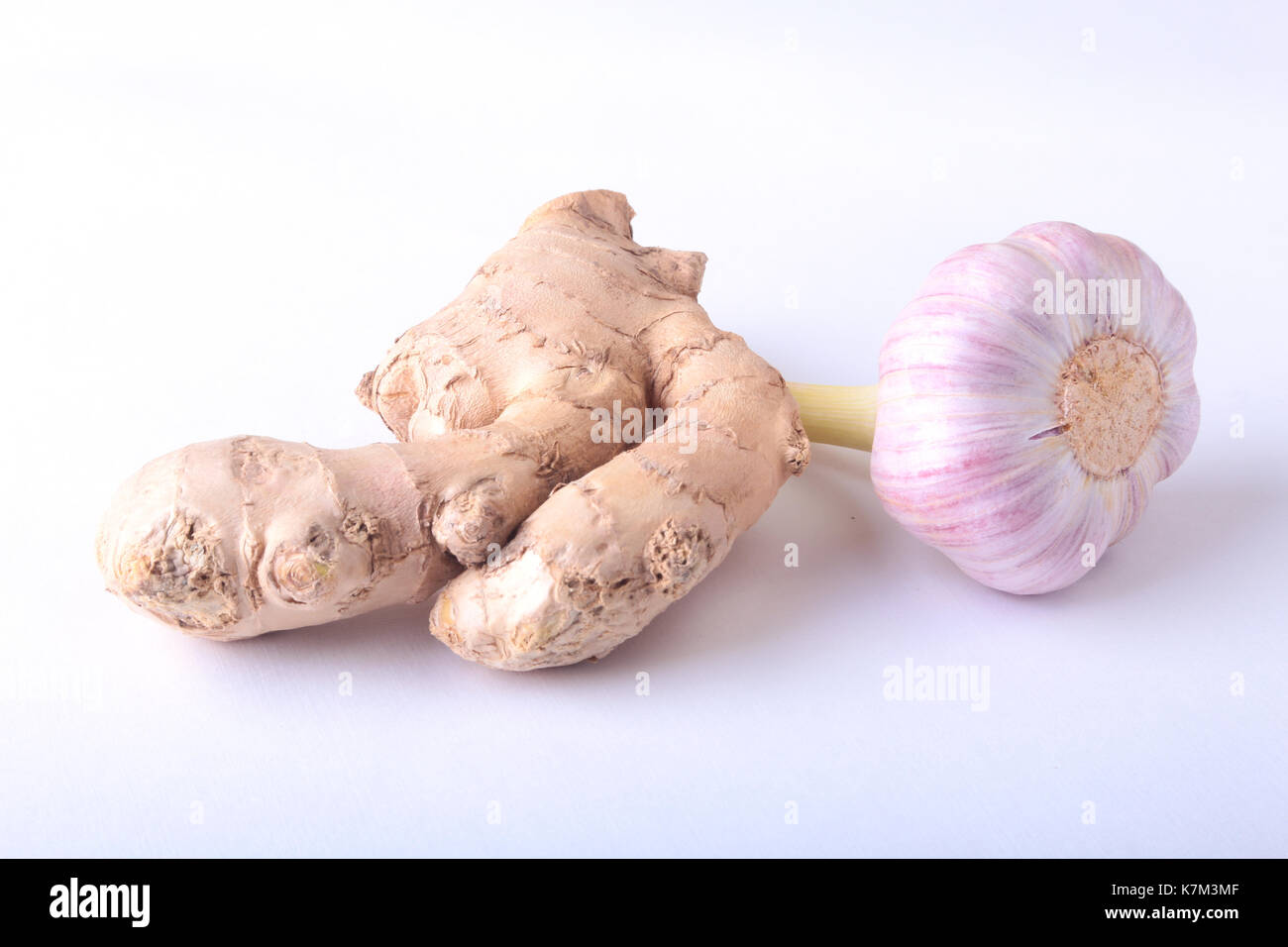 fresh ginger and garlic isolated on white background Stock Photo - Alamy