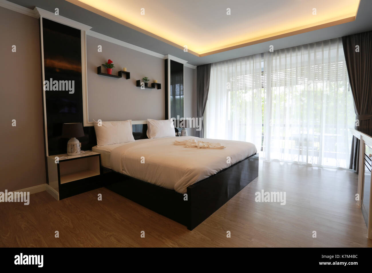 Bed in the bedroom,concept of relaxation interior Stock Photo - Alamy
