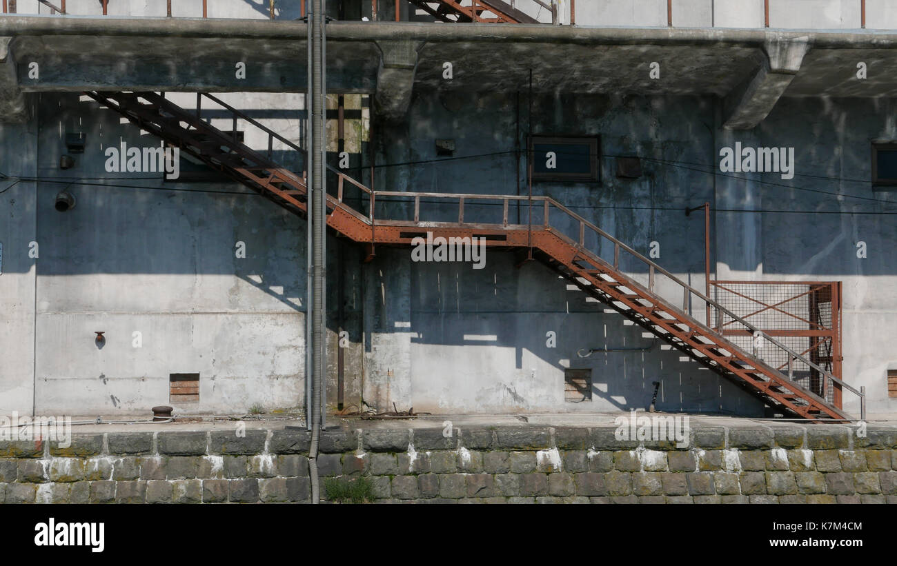 Tour boat passing in front of historic Hokkai Can Factory building in ...