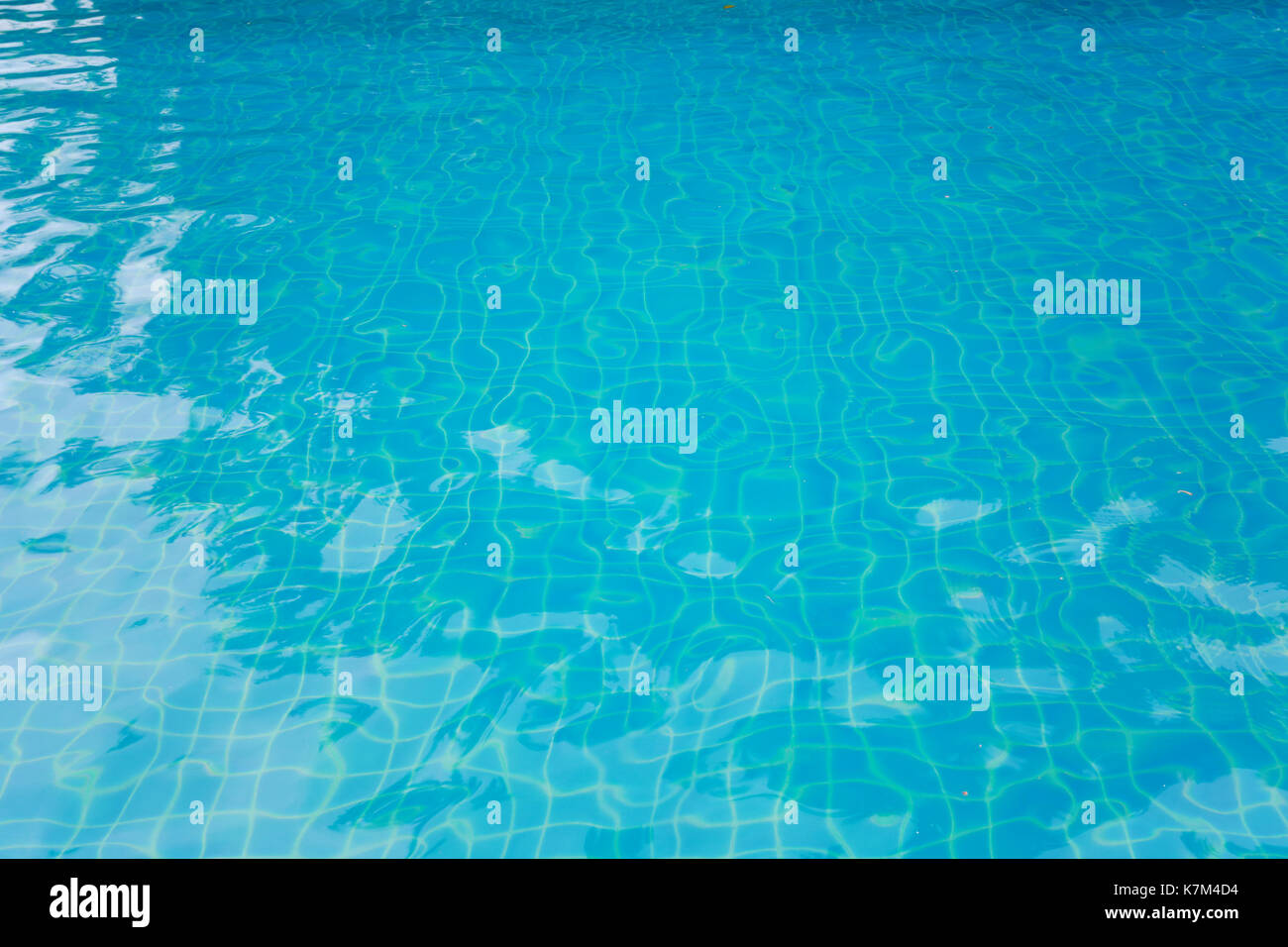 surface of the pool water in blue color for design nature backdrop in ...