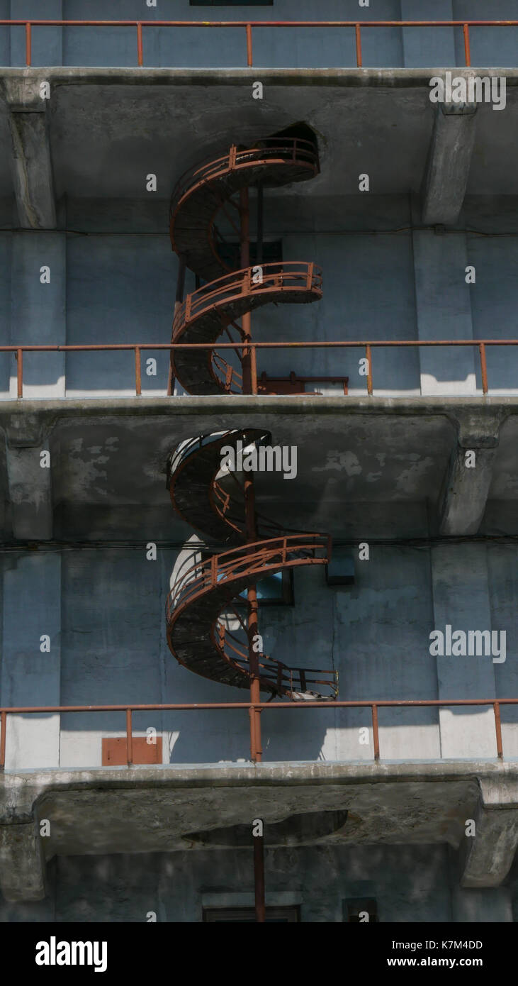 Tour boat passing in front of historic Hokkai Can Factory building in ...