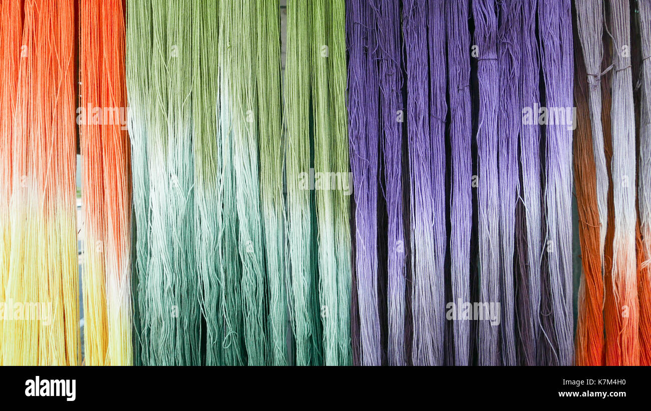 Kazu textile shop display of multi colored string in front of store in ...