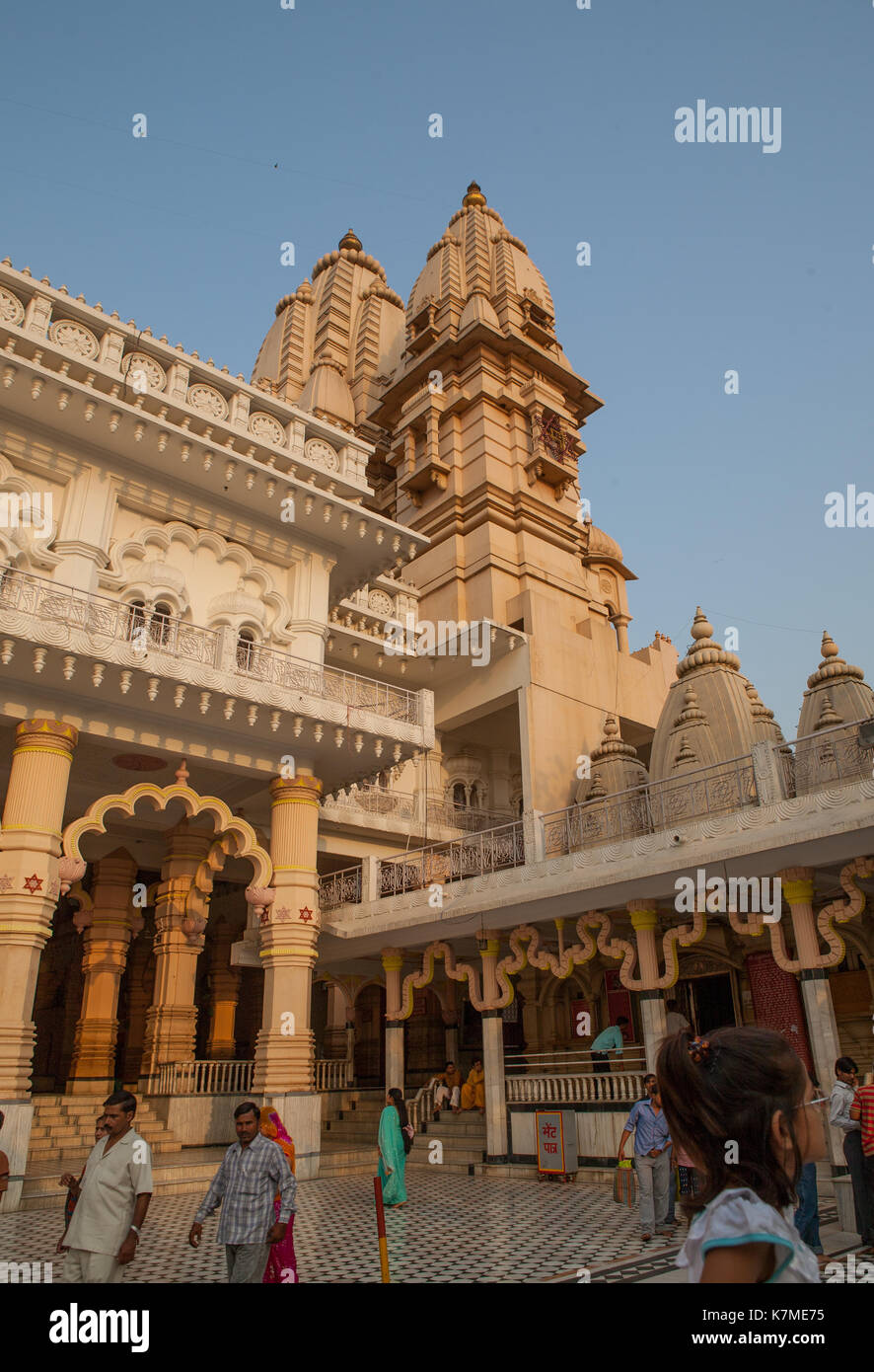 Hindu pilgrims near the Temple. The temple complex of Chattarpur Mandir ...