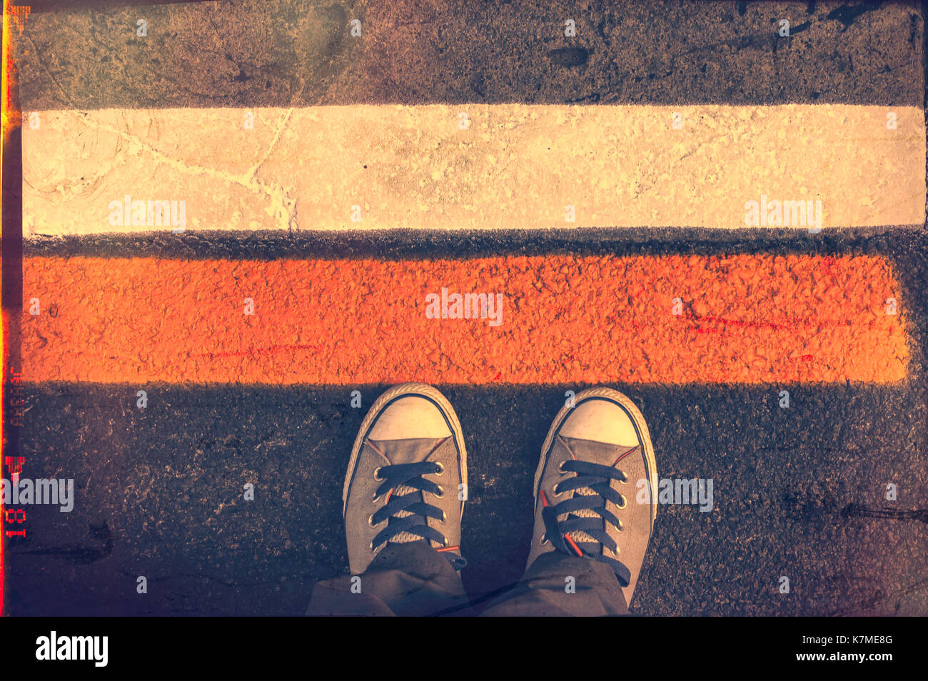 Stand behind yellow line hi-res stock photography and images - Alamy