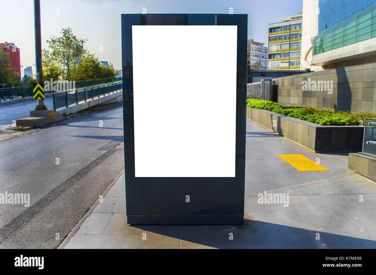 Black lightbox on the city street. Wood facades of modern Stock Photo ...