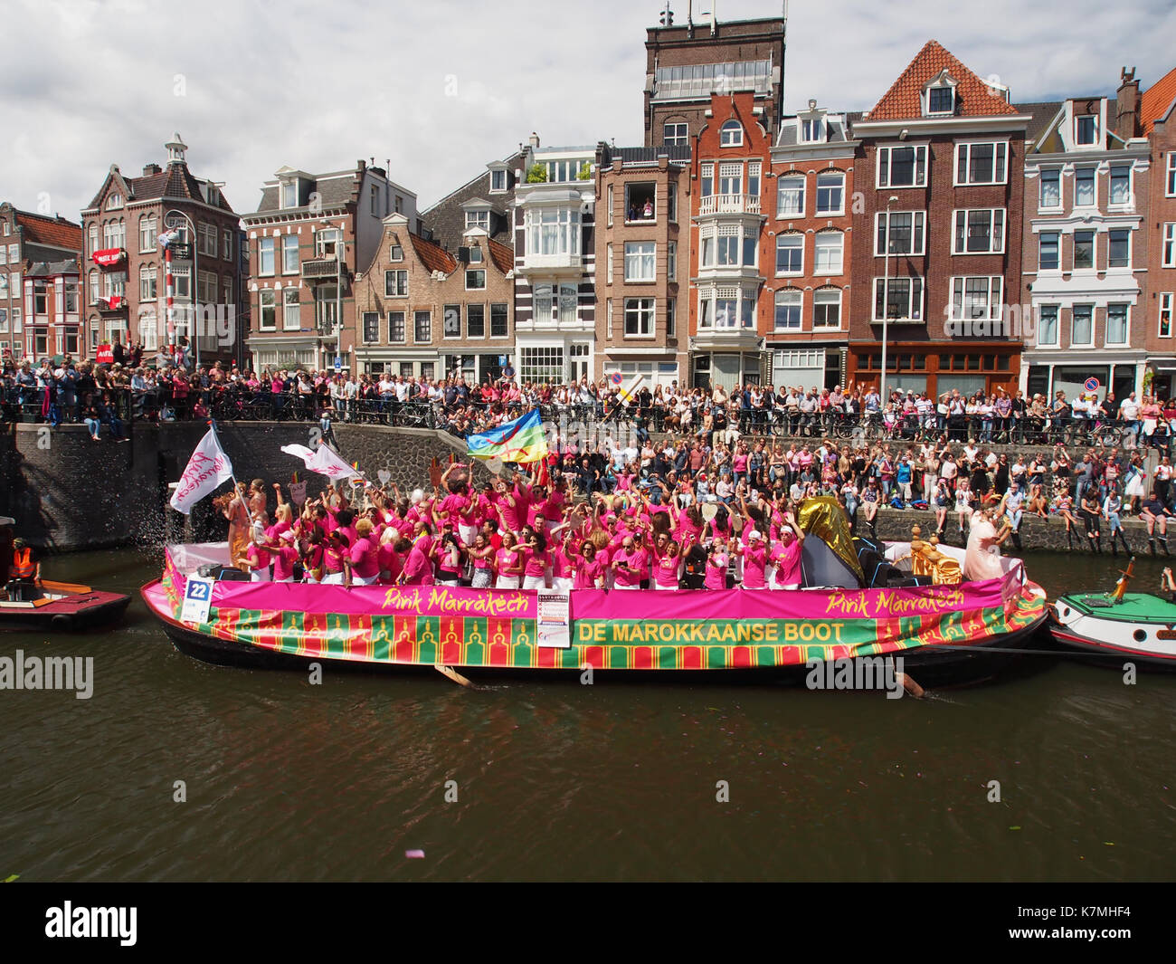 Boat 22, part of the Canal Parade in Amsterdam, features a pink theme ...