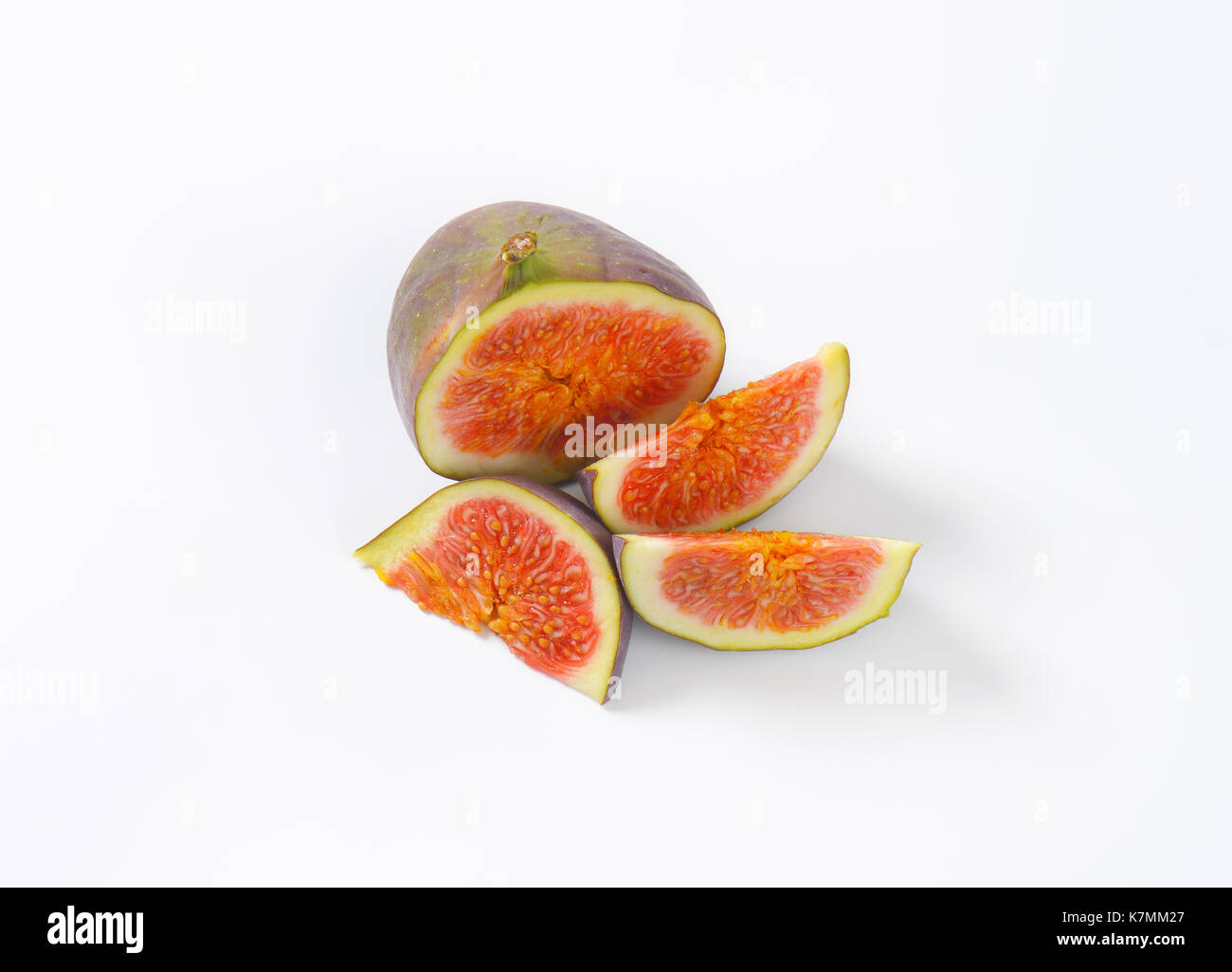 fresh sliced fig on white background Stock Photo - Alamy