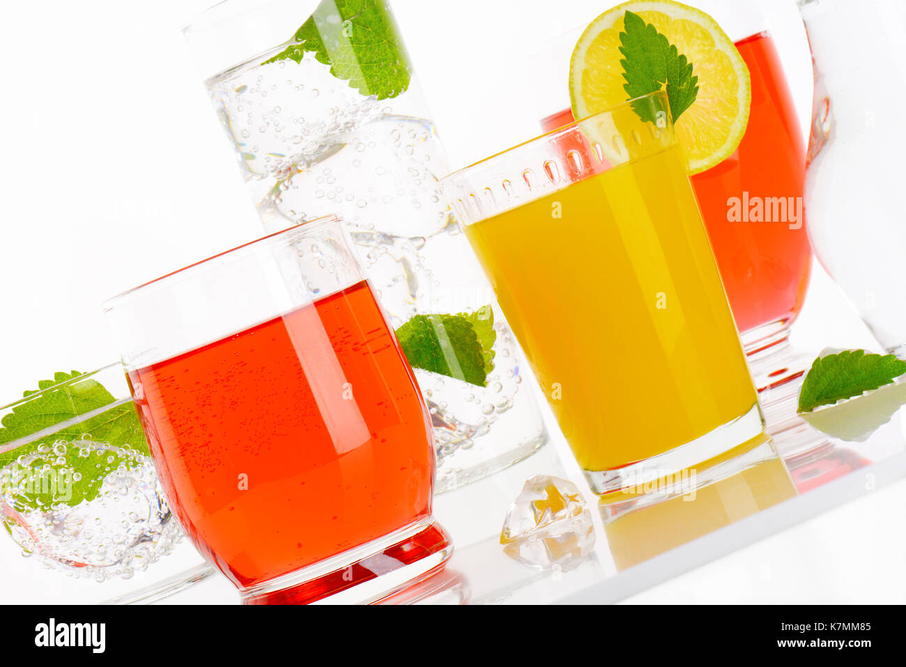 variety of summer cold drinks on white background - close up Stock ...