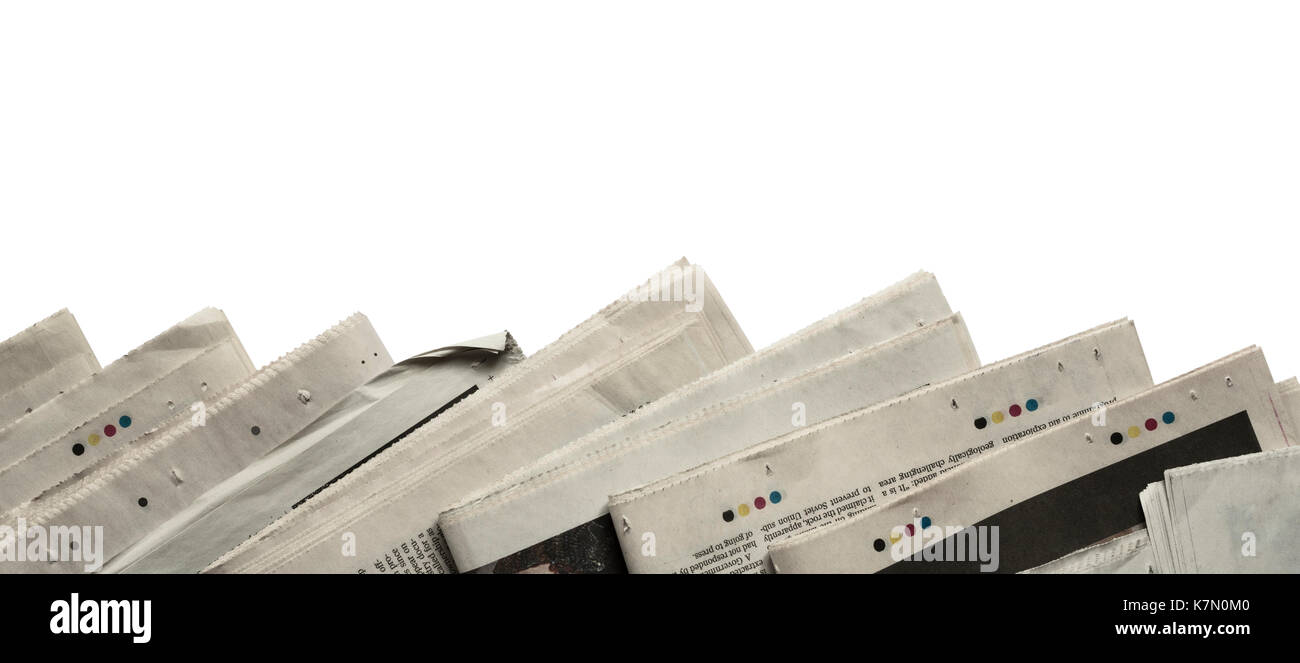 Newspapers covering bottom of image isolated on white background Stock ...