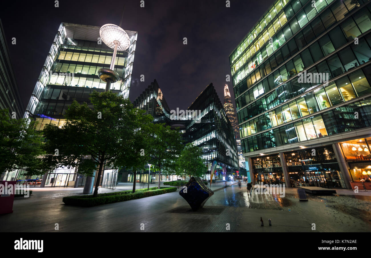 Waterfront at night, More London Riverside, The Shard at back, London ...
