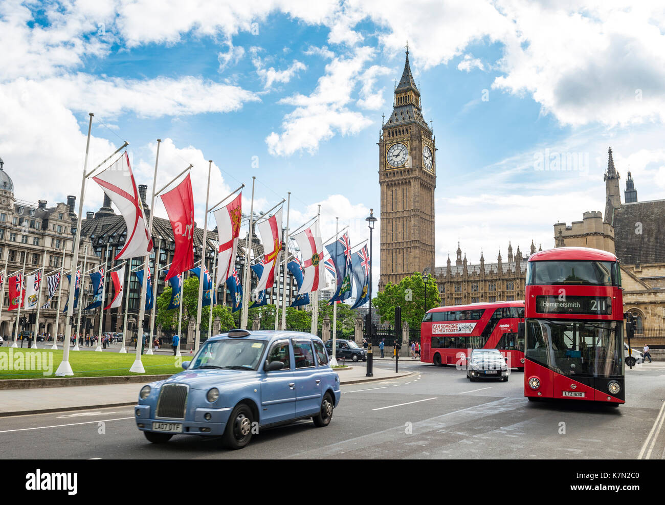 Taxi and red double-decker bus, Big Ben with Westminster Palace, London ...